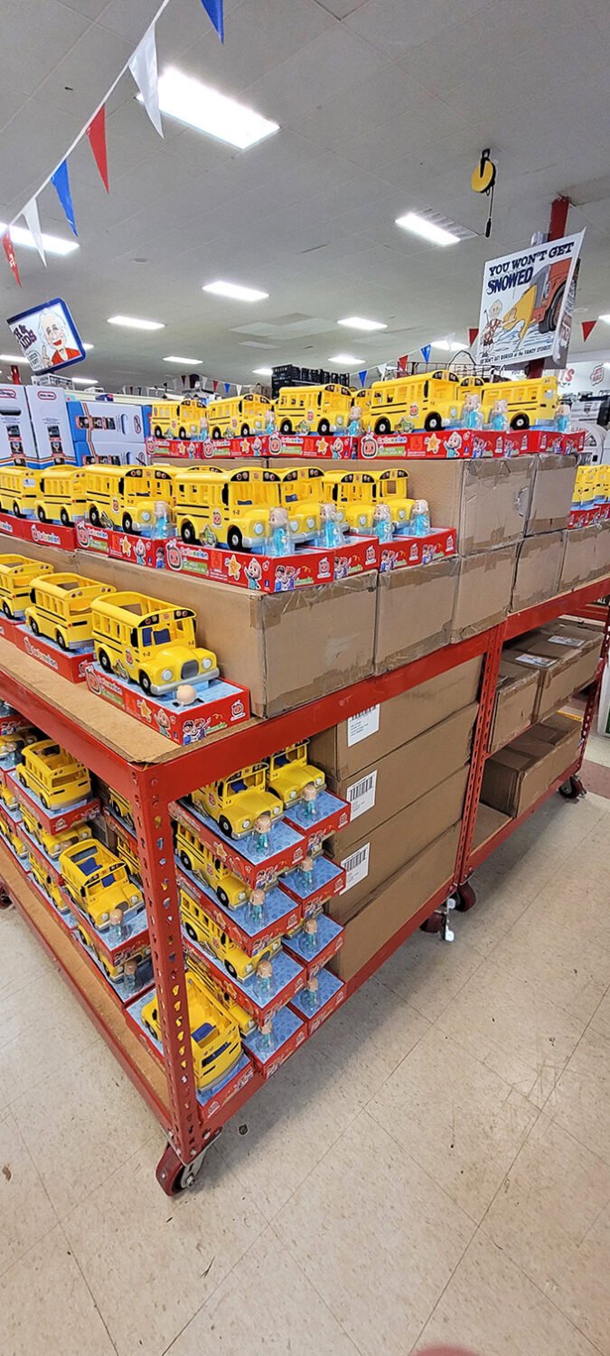 The yellow school bus brigade stands at attention. These toy vehicles aren't just transportation&mdash;they're childhood memories waiting to be made at bargain prices.