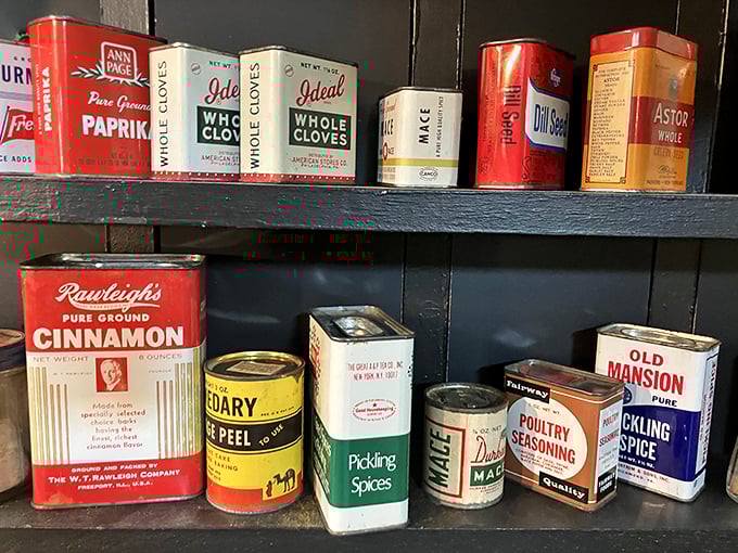 Grandma's spice cabinet, perfectly preserved. These vintage tins once flavored Sunday dinners and holiday feasts, their graphics as deliciously nostalgic as the memories they evoke.