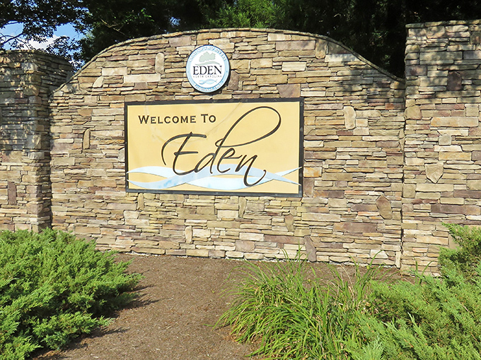Eden's welcome sign promises exactly what it delivers&mdash;a slice of paradise for those seeking small-town tranquility. The stone construction feels as solid as the community itself.