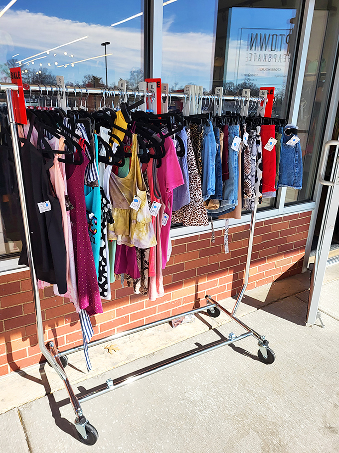 Sidewalk sales that make window shopping dangerous to your budget. These colorful garments beckon passersby with their siren song of savings.