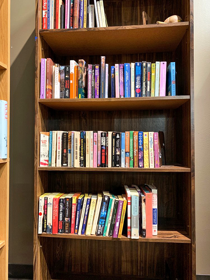 Books stacked with precision&mdash;literary treasures at pocket-change prices. The paperback romance section alone could fuel a winter's worth of guilty pleasures.