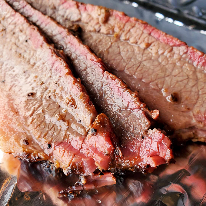 Behold the brisket in all its glory&mdash;that pink smoke ring and caramelized bark are the BBQ equivalent of Michelangelo's David.