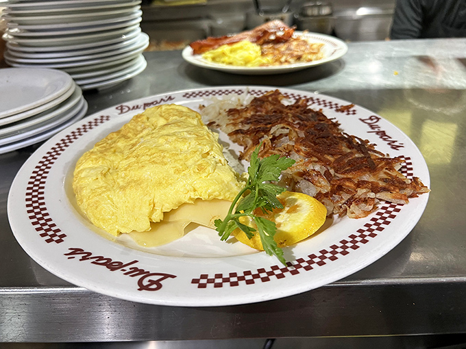 Fluffy omelet meets crispy hash browns in a breakfast duet that sings "good morning" to your taste buds.