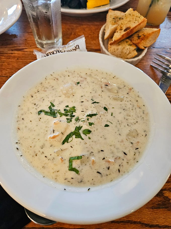 The holy grail of New England comfort&mdash;creamy clam chowder garnished with fresh herbs that makes you forget you're 200 miles from the nearest ocean.