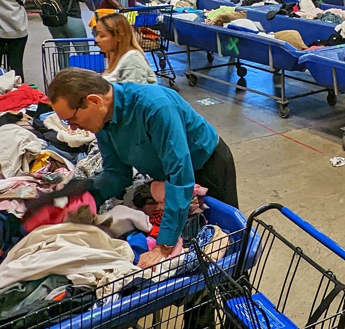 The art of the hunt in full display. Like stock traders on Wall Street, these shoppers know exactly when to dive in for maximum return.