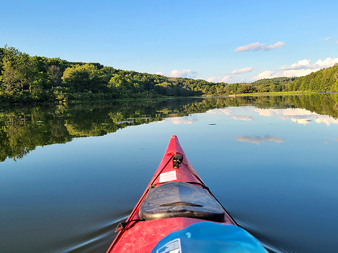Kayaking Lackawanna Lake feels like gliding through a Bob Ross painting&mdash;happy little trees included, no artistic talent required.