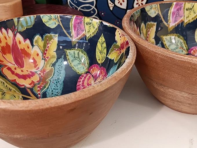 These vibrant wooden bowls tell stories of previous dinner parties while awaiting new adventures on your table&mdash;for a fraction of retail price.