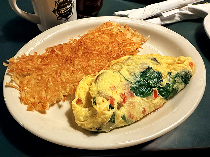 This omelet and crispy hash browns combo is the breakfast equivalent of finding an extra $20 in your winter coat pocket.