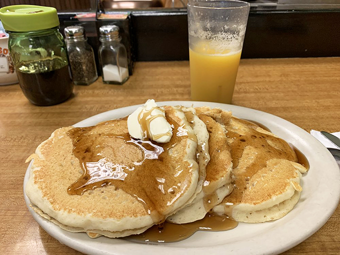 Golden pancakes with melting butter and maple syrup cascading down the sides &ndash; morning indulgence in its purest form.