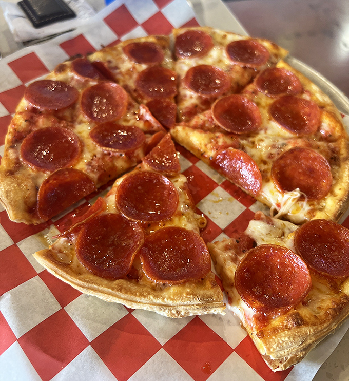 Pepperoni perfection in its purest form&mdash;crispy-edged discs of spicy goodness nestled on a sea of bubbling cheese and tangy sauce.