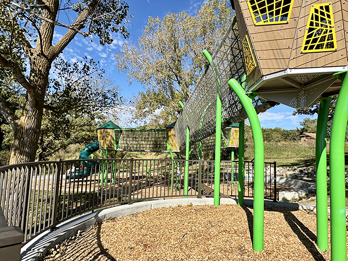 Not your average playground! These towering structures let kids burn energy while parents enjoy views that beat any office window on the planet.