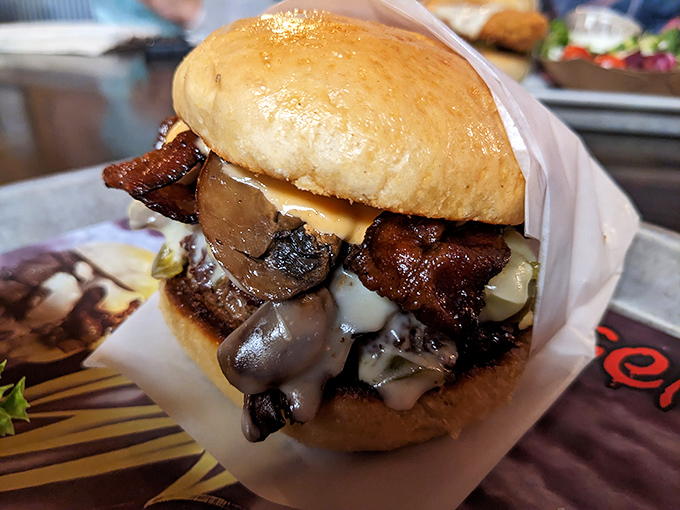 The Roadhouse Burger doesn't just satisfy hunger&mdash;it negotiates a peace treaty with it. That bacon is practically glistening with promises.