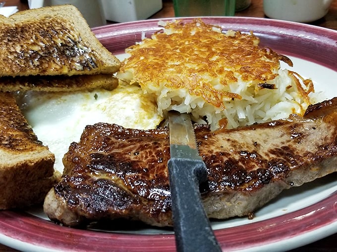The steak and eggs with those impossibly crispy hash browns could make a lumberjack weep with joy. Protein paradise on a plate!