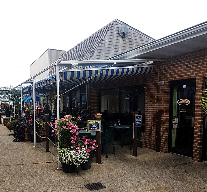 Arena's storefront brings a touch of charm to Rehoboth Beach, with flower boxes that say "vacation" and sandwiches that say "wow."