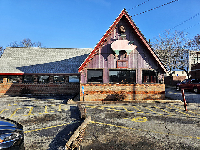 That cheerful pig sign tells you everything&mdash;this is where serious barbecue and comfort food magic happens.