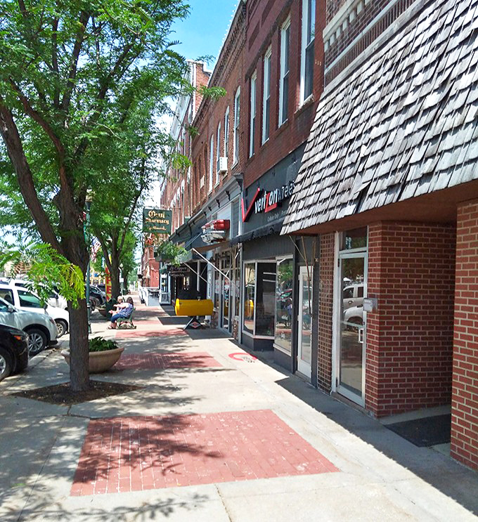 A warm tree-lined corner of Centerville's sun-dappled streets on a perfect Iowa day. Some towns you drive through, others&mdash;like this one&mdash;invite you to slow down and stay awhile.