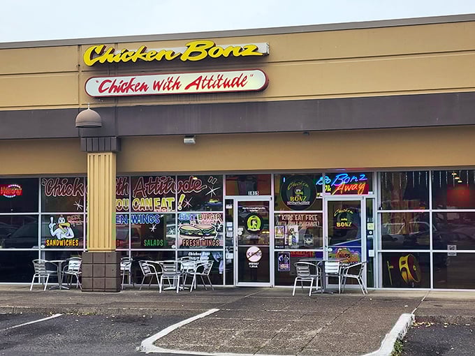 "Chicken with Attitude" isn't just a slogan at Chicken Bonz. The neon signs and colorful facade set the stage for flavor drama.