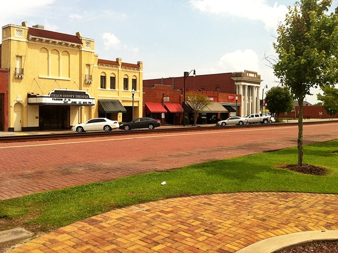 Historic downtown Dillon features charming brick streets and well-preserved buildings, including the local theater with its distinctive yellow facade.