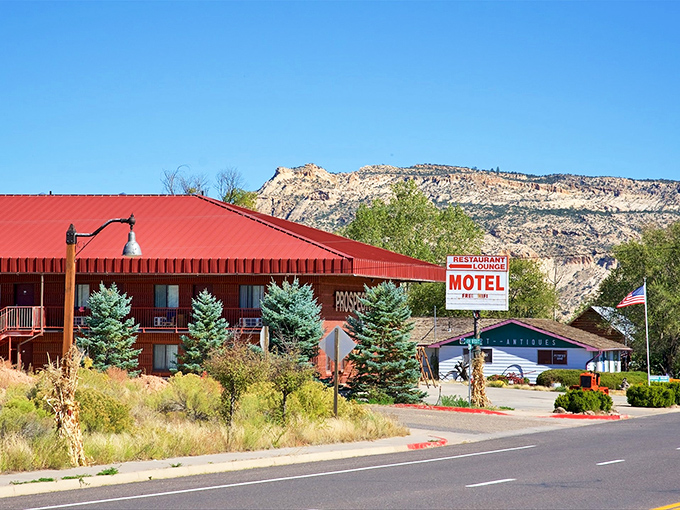 Escalante's Circle D Motel beckons road-weary travelers with its vintage sign and mountain backdrop&mdash;like a Wes Anderson film set in the wild west.