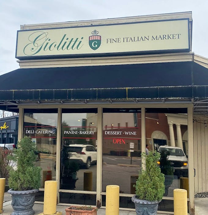 Giolitti's elegant storefront hints at the Italian treasures within. Those potted plants standing guard like tiny Mediterranean sentinels.