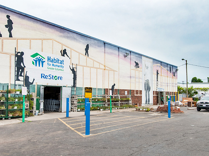 Columbus Habitat's building mural tells the story of its mission&mdash;construction silhouettes building homes and hope simultaneously.