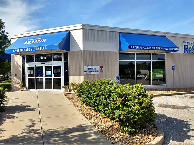The bright blue awnings of Bloomington's Habitat ReStore beckon bargain hunters like a furniture treasure island waiting to be explored.
