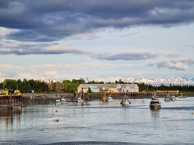 Kenai's waterfront stretches toward mountains that frame your view like nature's own picture window display.