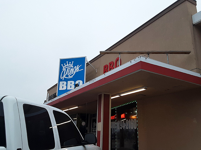 King's BBQ keeps it simple with their royal blue sign. No fancy frills needed when your smoker does all the talking.