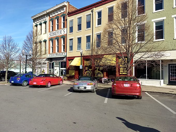 Historic storefronts in downtown Portsmouth showcase colorful buildings housing local businesses like Schaefer's Food Market.