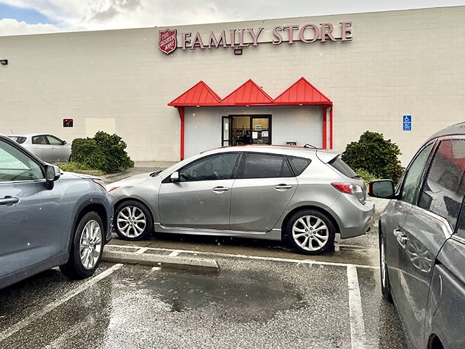 The Salvation Army's iconic red awning&mdash;like a welcome mat for treasure hunters. Inside, furniture awaits adoption at prices that feel like highway robbery.