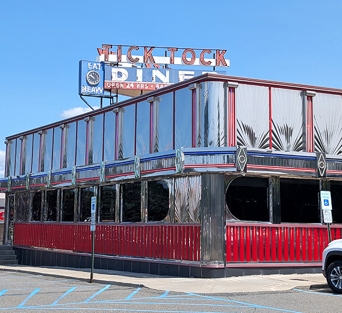 Tick Tock Diner's chrome-and-neon exterior is pure Jersey magic – a 24-hour monument to disco fries and impossibly tall cakes.