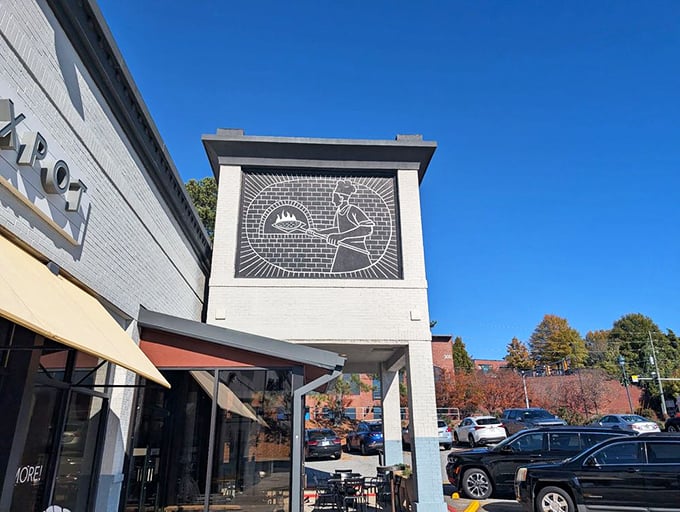 The distinctive mural highlights the hearth, welcoming guests to enjoy the fresh, wood-fired flavors of the tavern.