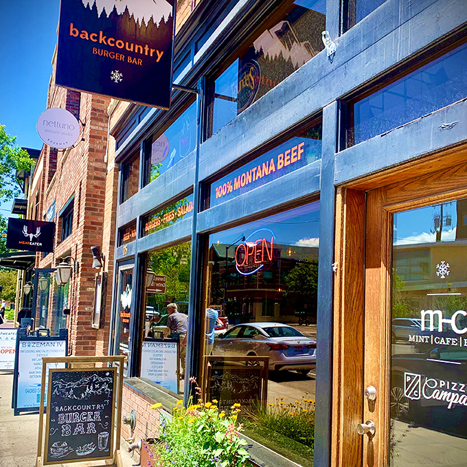 Sunshine gleams off Backcountry's windows &ndash; nature's spotlight on one of Bozeman's burger treasures.
