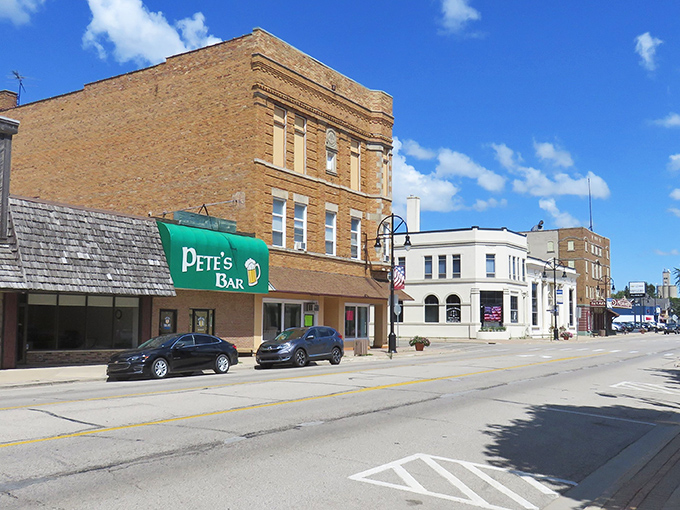 Bad Axe's sunny main street offers clear skies and even clearer budget benefits. Retirement dollars stretch like those clouds overhead.