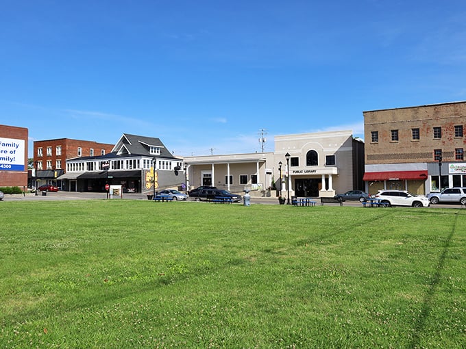 The town square's green space and historic storefronts create a perfect setting for budget-friendly retirement living.