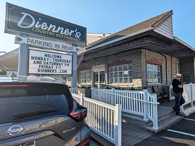 The charming building with its white railings promises the kind of home-cooked meals that make you want to return tomorrow.
