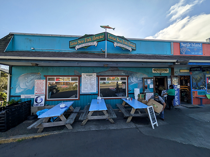 Blue picnic tables invite you to feast outdoors while contemplating life's big question: "Should I order seconds?"