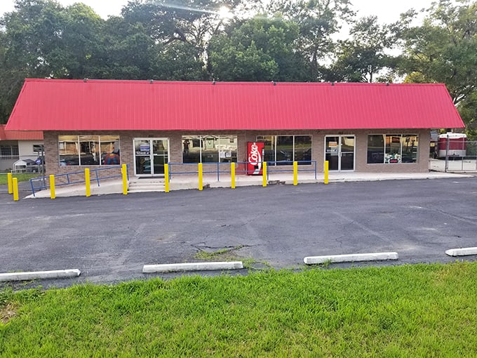 Mike's stretches out like a red-topped furniture buffet, with yellow safety poles guarding all those treasures.