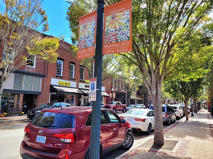 Downtown New Bern buzzes with activity under shady trees, where MumFest banners hint at community celebrations that won't empty your wallet.