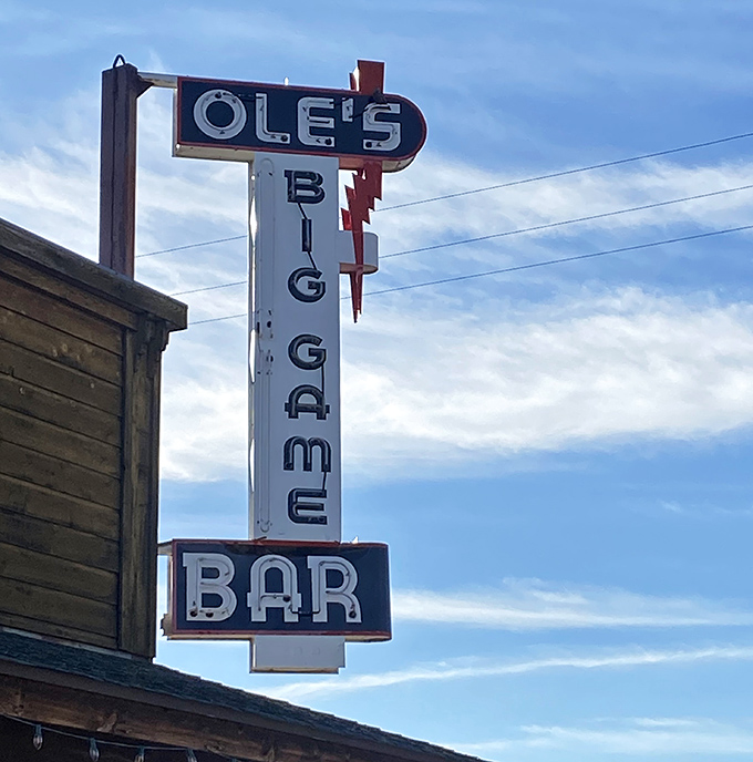 That vintage sign promises two things Ole's delivers in spades: big game trophies on the walls and serious steak expertise on your plate.
