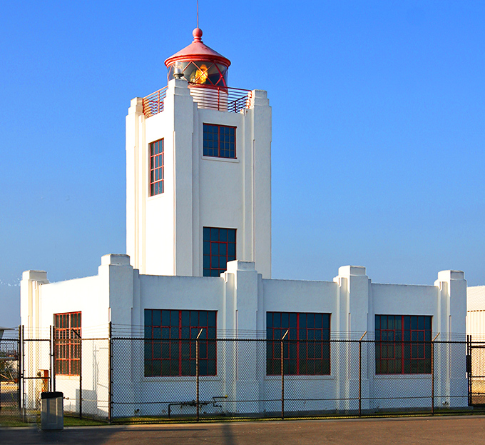 This Art Deco lighthouse stands sentinel over working waters, where cargo ships and fishing boats share the stage.