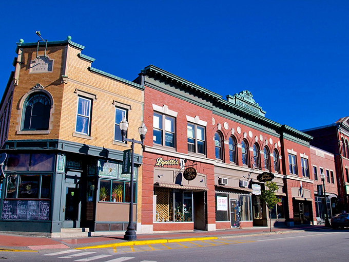 Historic brick buildings in Skowhegan stand as testaments to the town's industrial past, now housing local businesses that keep the community thriving.
