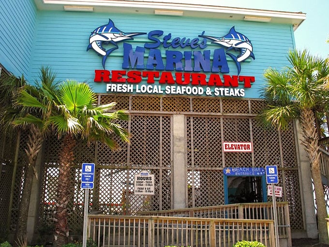 Those twin marlins flanking the sign aren't just decoration—they're practically daring you to try the catch of the day.