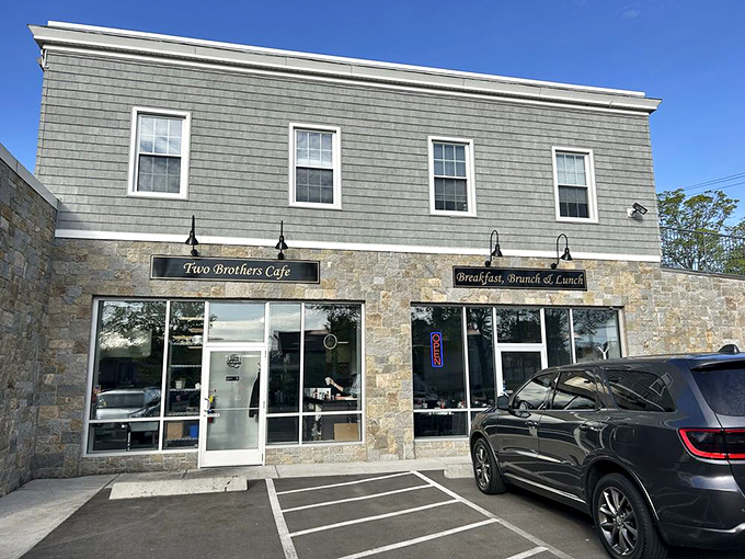 Clean lines and natural stone make Two Brothers Cafe stand out. When your breakfast spot looks this good from the outside, expectations rise accordingly.