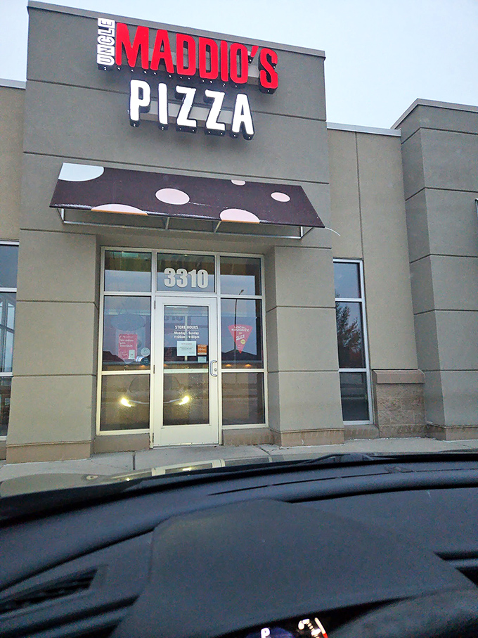 The clean lines and bold signage of Uncle Maddio's Pizza hint at the straightforward deliciousness waiting inside.