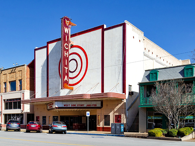 The Wichita Theatre's vintage marquee promises entertainment that won't drain your fixed income. Retirement dollars take center stage in this charming town!