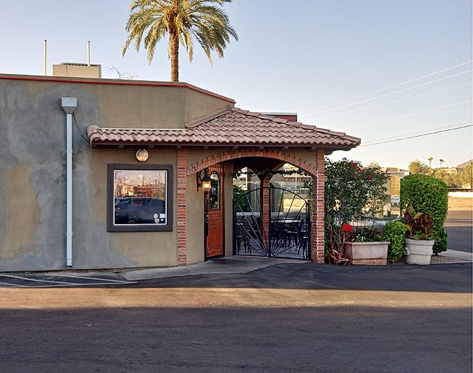 That Spanish-style entrance isn't just pretty&mdash;it's the gateway to pizza paradise, where every bite feels like a mini vacation.
