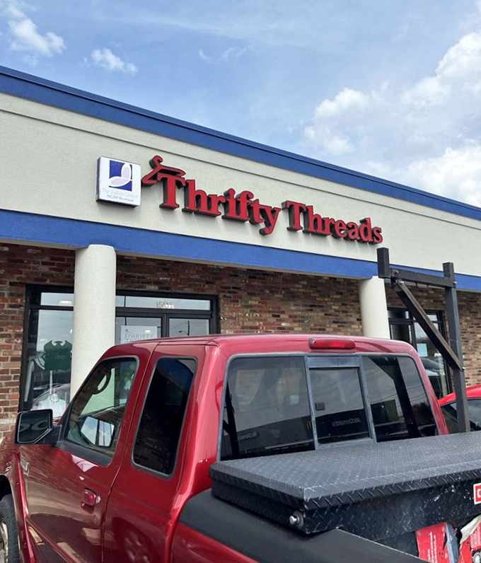 Same red sign, different angle &ndash; Thrifty Threads stands ready for bargain hunters with an eye for quality.