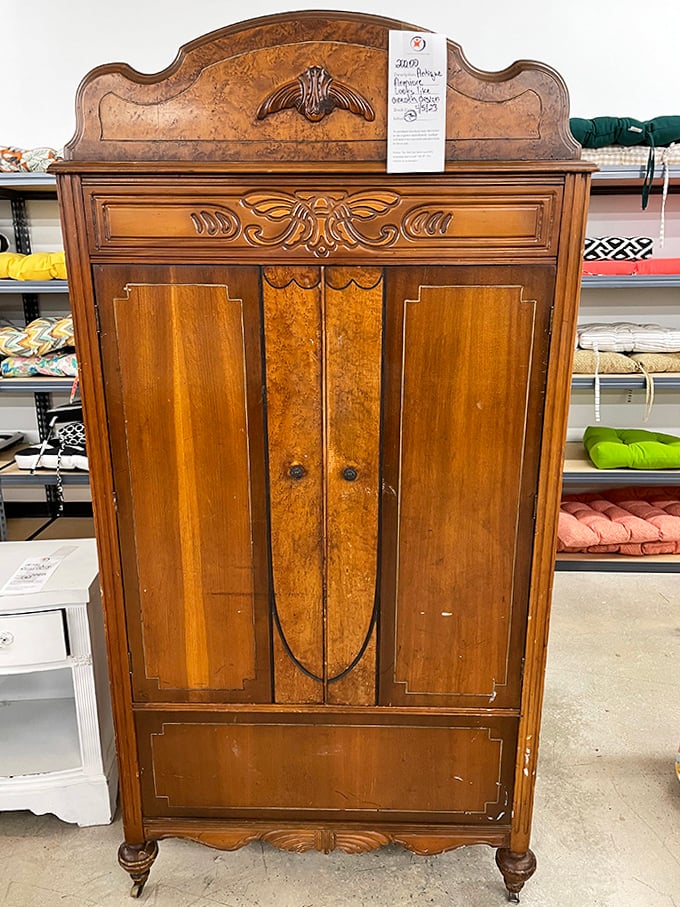 This isn't just a wardrobe—it's practically a portal to Narnia. Carved details and burled wood panels showcase craftsmanship from an era when furniture was built to last generations.