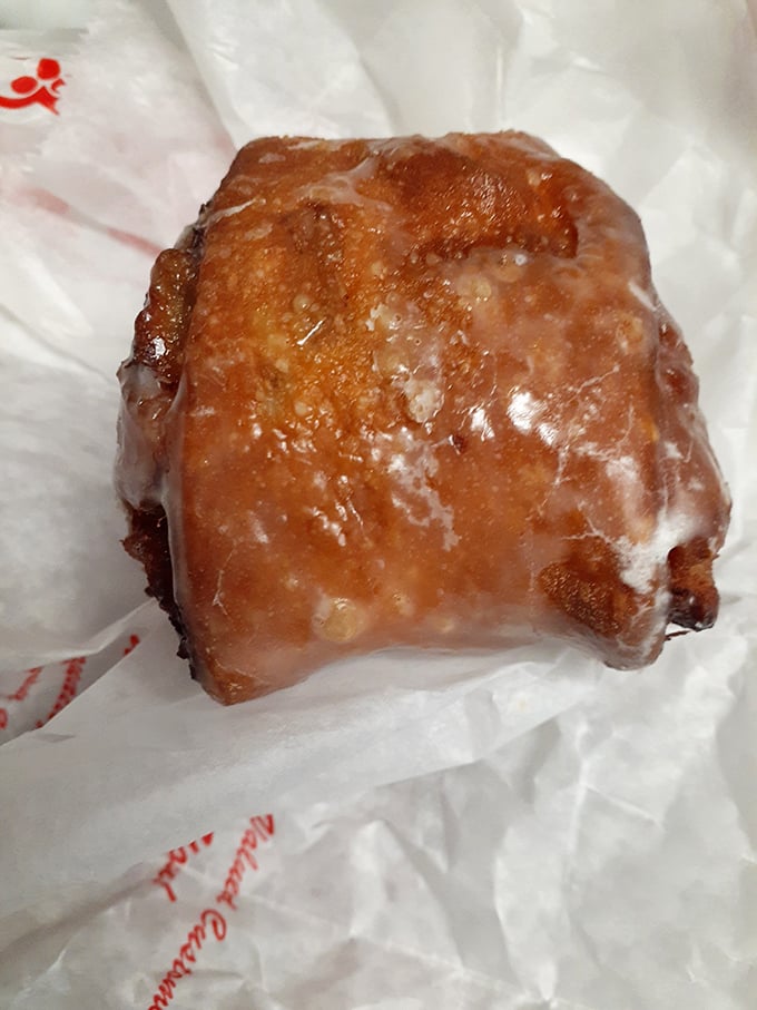 The apple fritter &ndash; that magnificent intersection of donut and apple pie &ndash; glistening with glaze that crackles between your teeth.